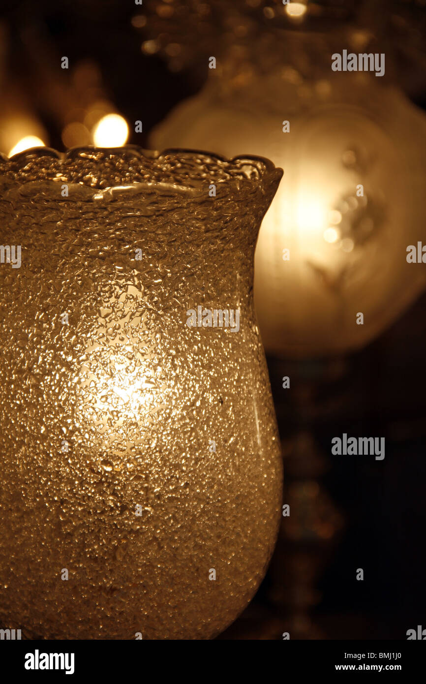 glass table lampshades in shop window at night Stock Photo - Alamy