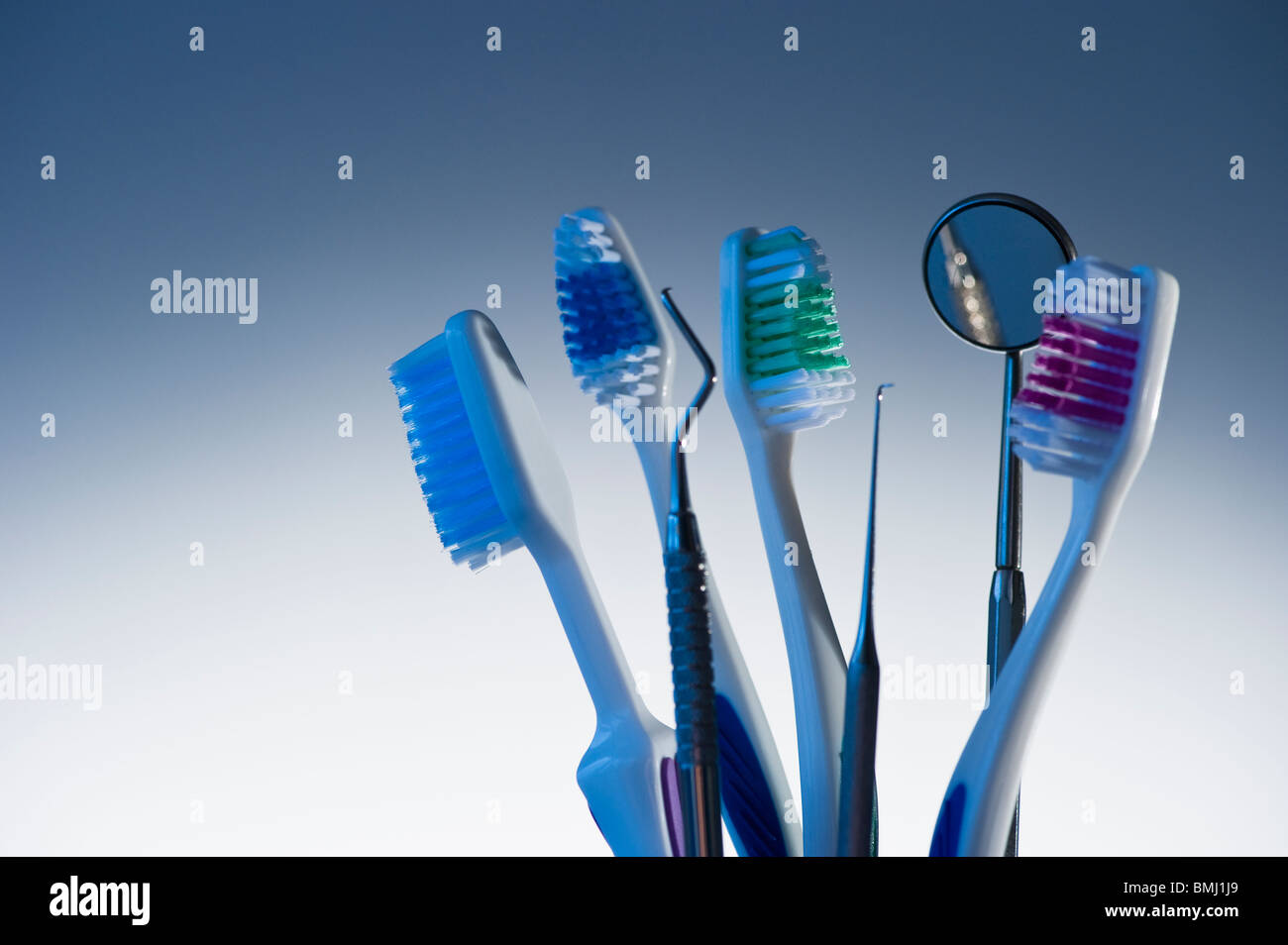 Toothbrushes and dental instruments Stock Photo - Alamy
