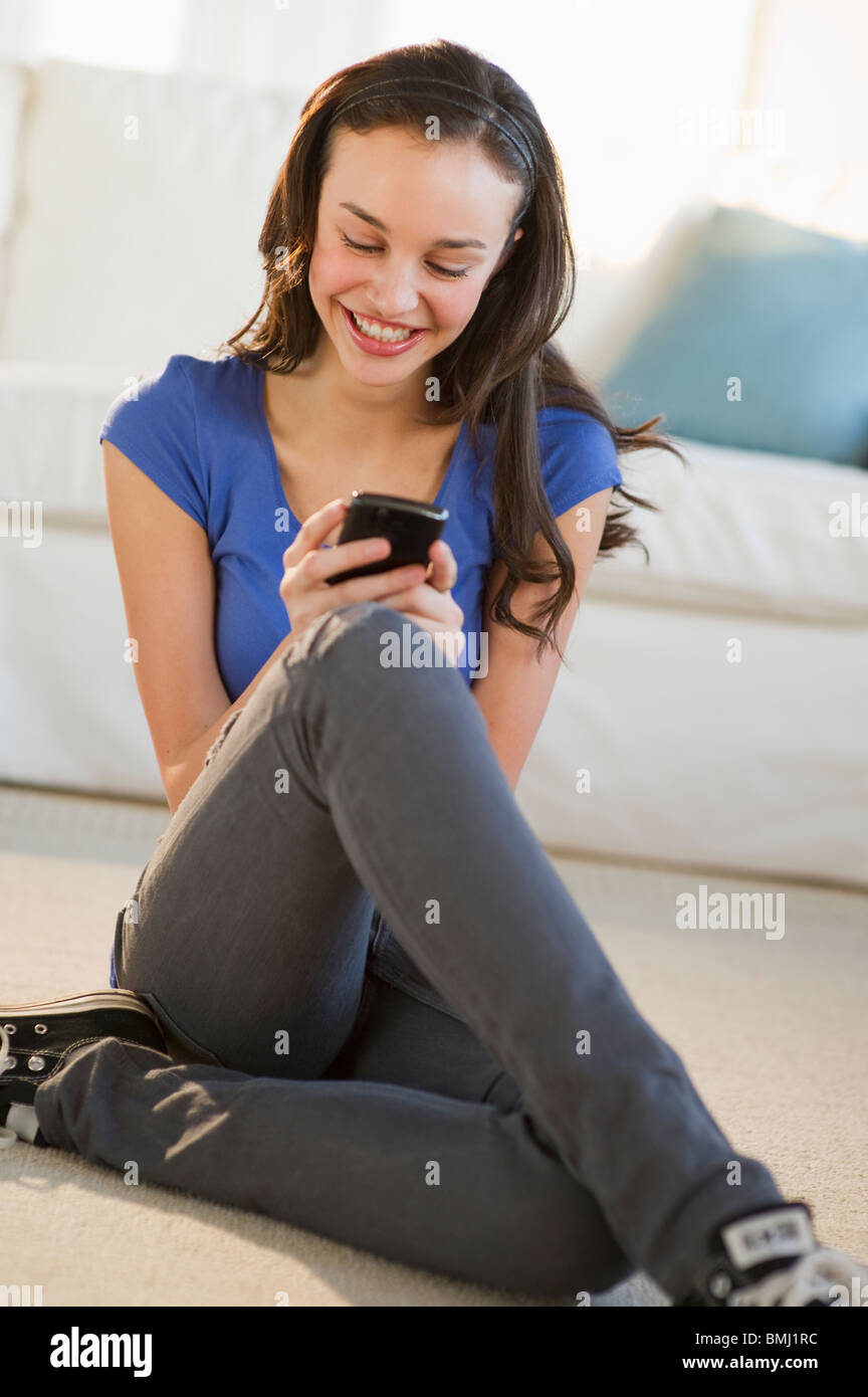 Teenage girl texting Stock Photo - Alamy