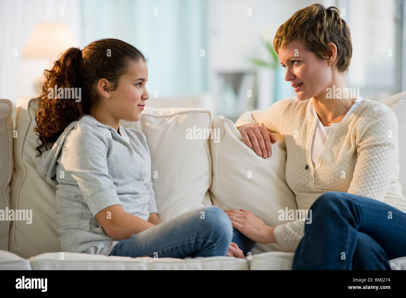 Mother and daughter having a serious talk Stock Photo - Alamy