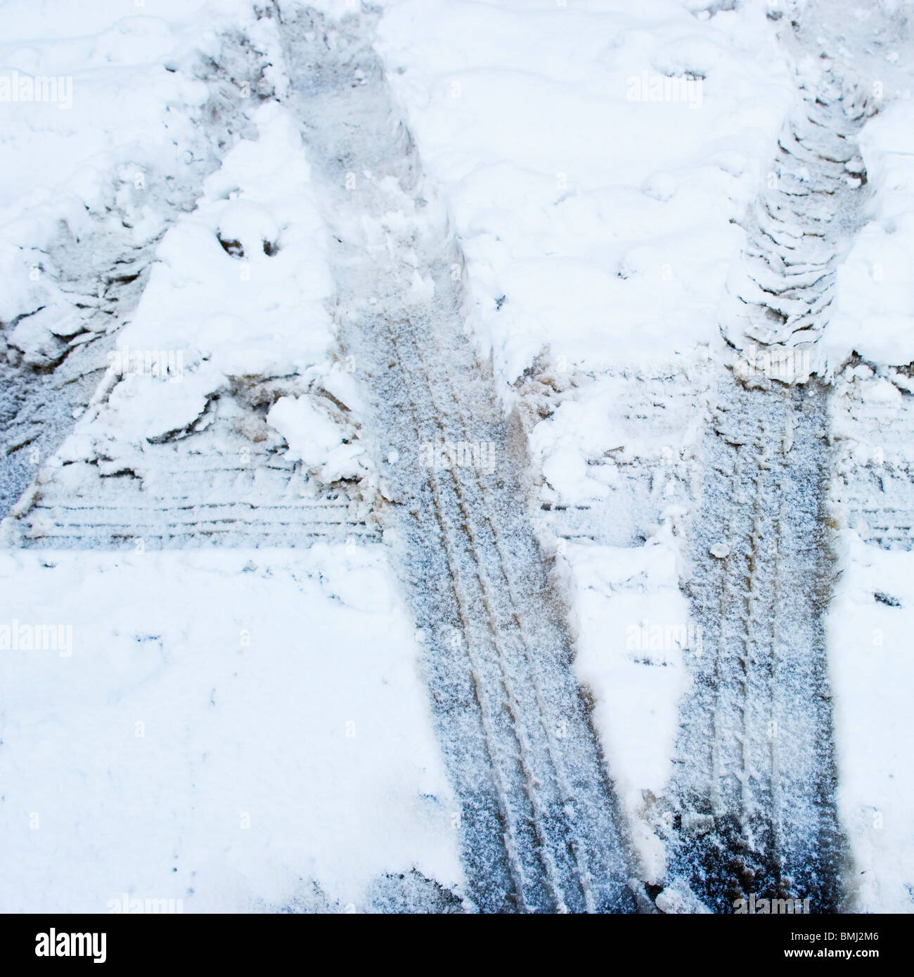Tire tracks in snow Stock Photo - Alamy