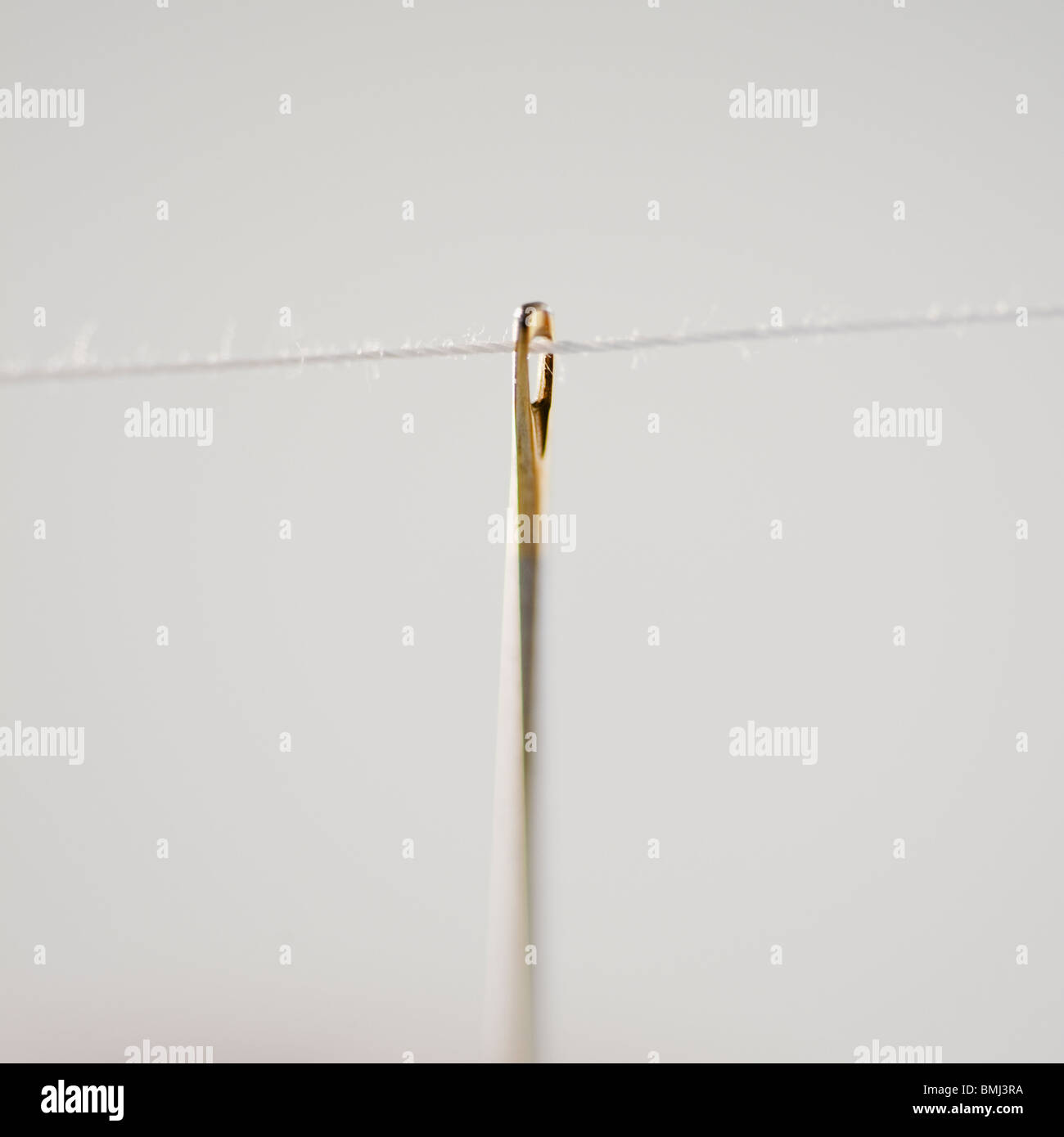 Threaded needle hi-res stock photography and images - Alamy