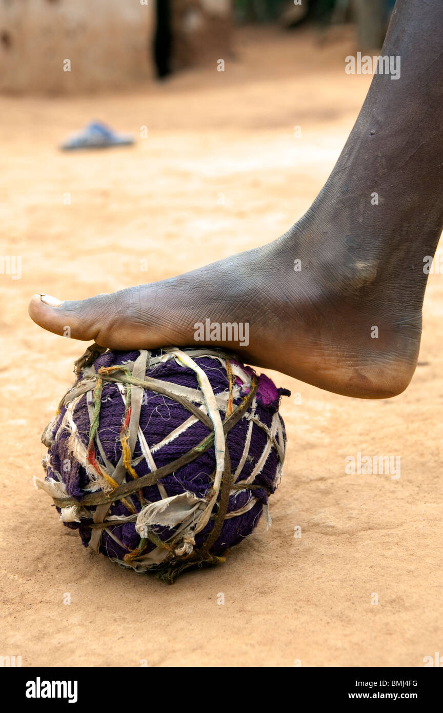 Children playing football with homemade ball Stock Photo - Alamy