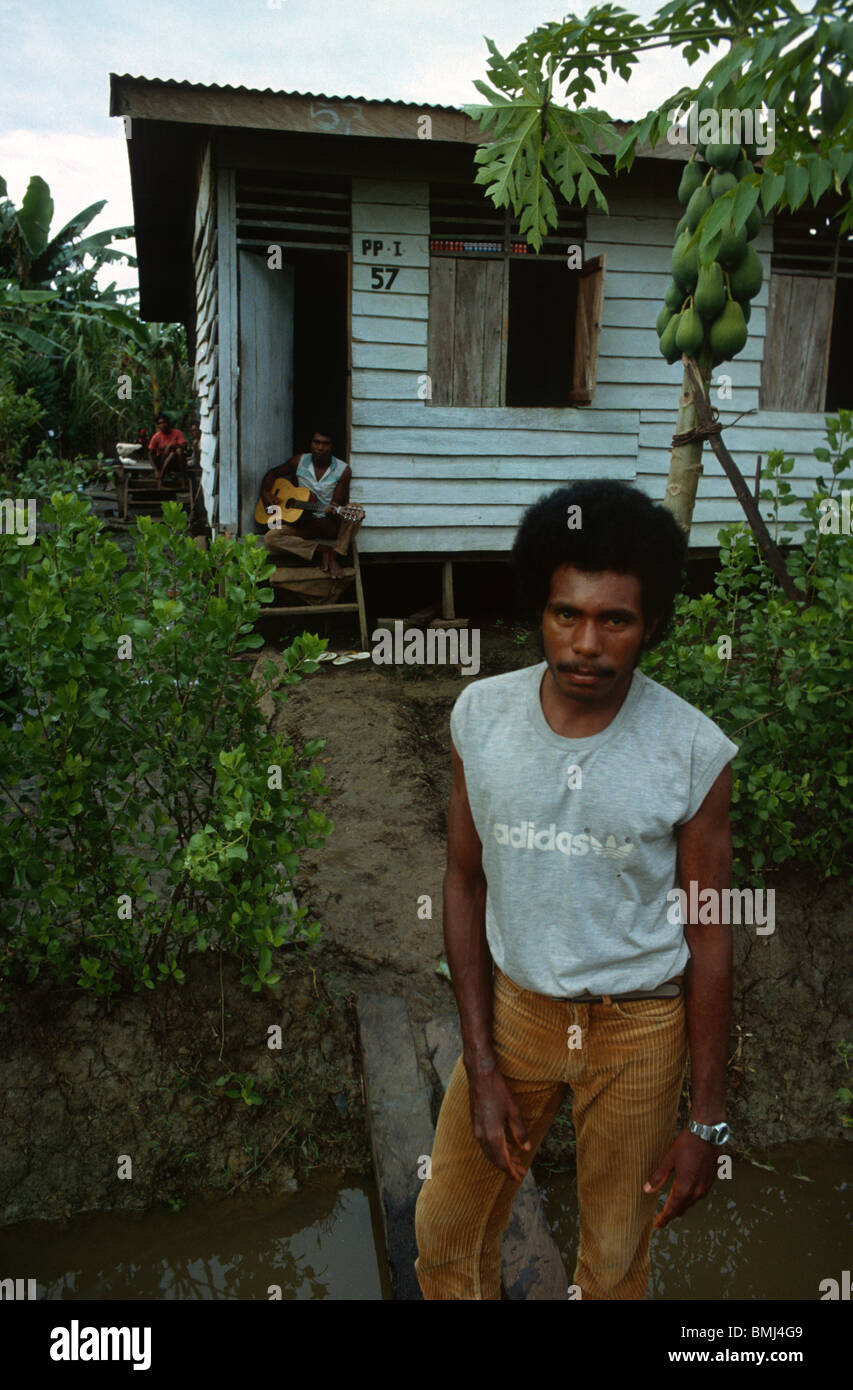 Papuan man in a resettlement camp, West Papua. Indonesia Stock Photo ...