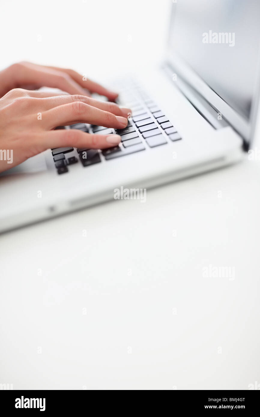 Fingers typing on keyboard Stock Photo - Alamy