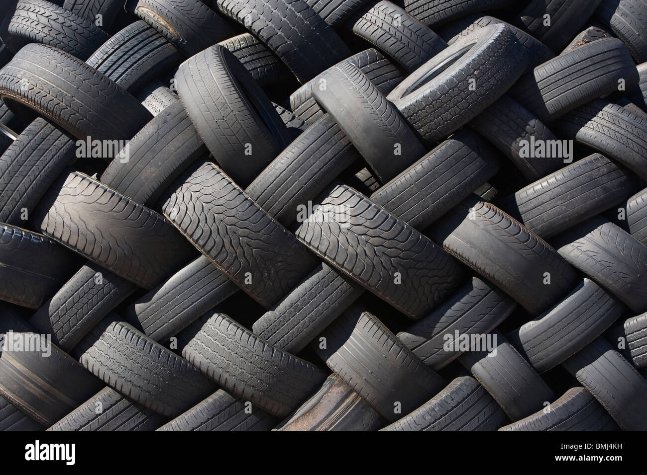 Pile of used tires Stock Photo - Alamy