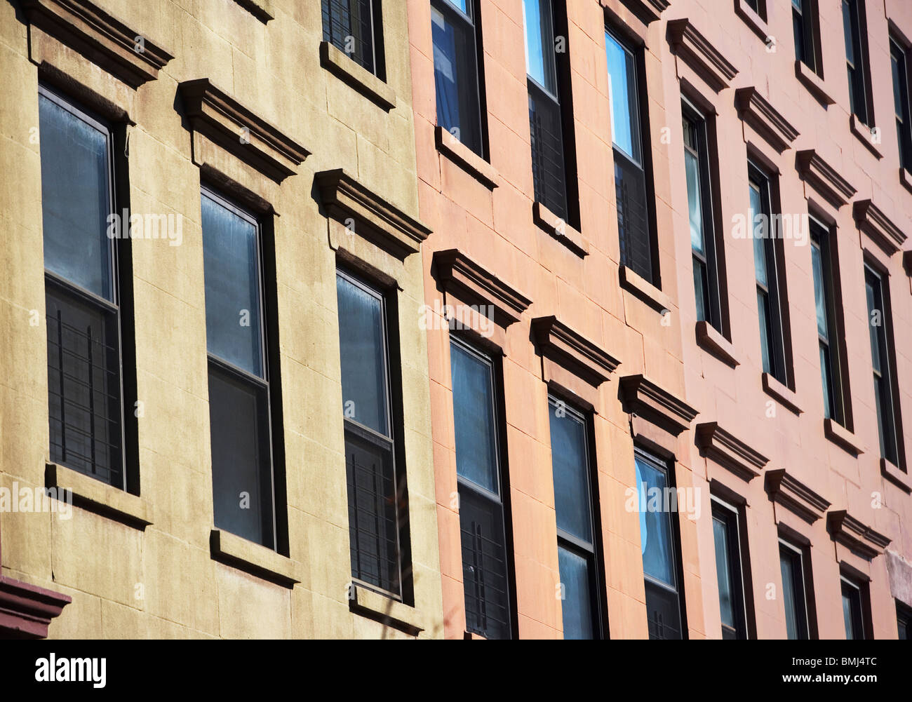 Windows on side of building Stock Photo - Alamy