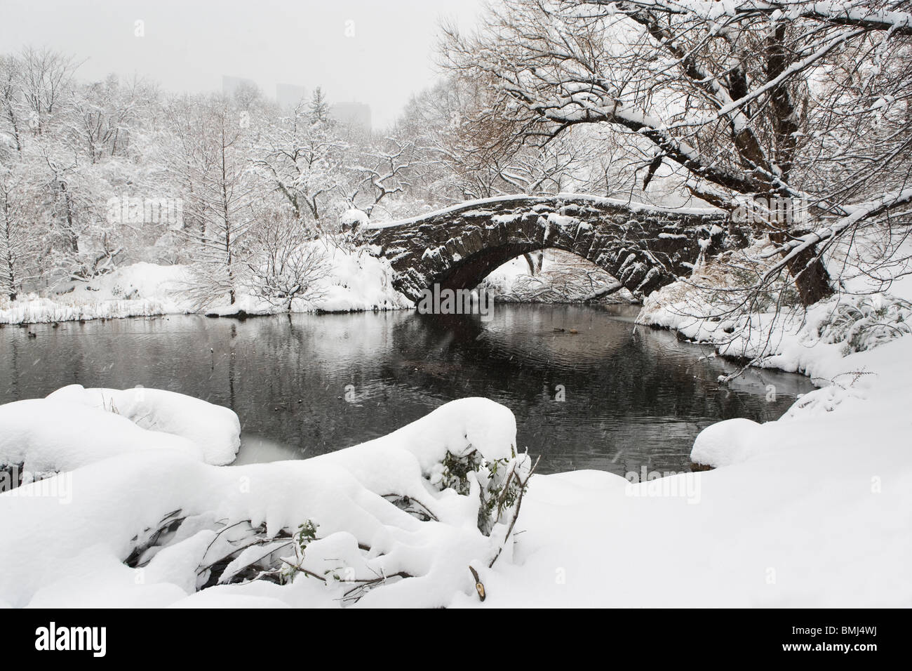 Lake and bridge in winter Stock Photo - Alamy