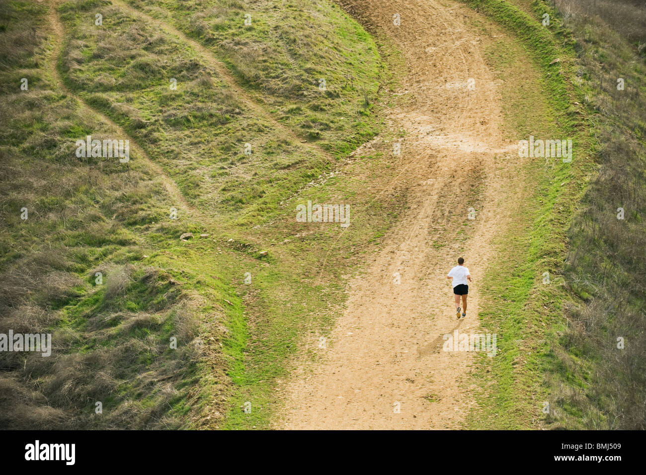Person running on trail Stock Photo - Alamy