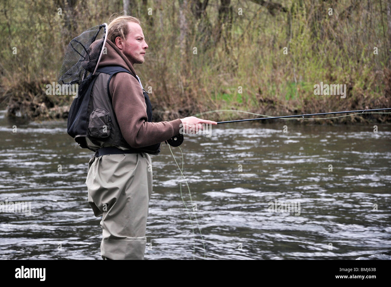 Man fly-fishing in river Ribnik Bosnia and Herzegovina Stock Photo - Alamy