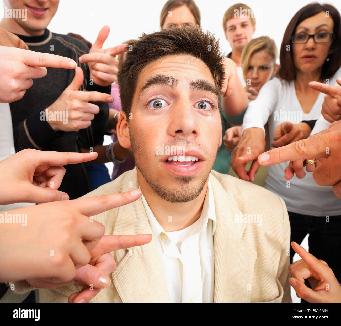 group of people pointing at one person Stock Photo: 29903909 - Alamy