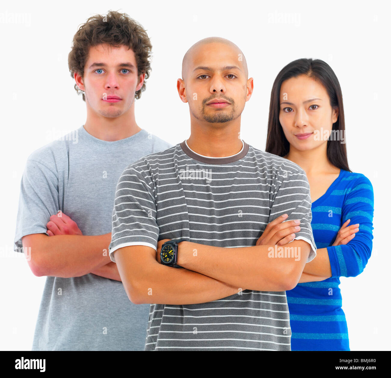 three people with their arms crossed Stock Photo - Alamy