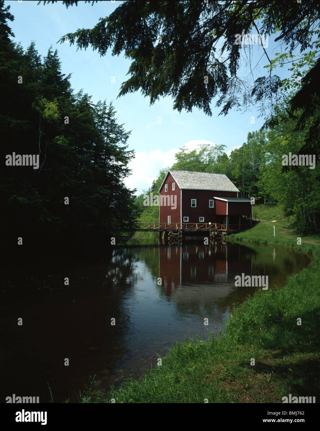 Old Red Mill by River, Canada Stock Photo - Alamy