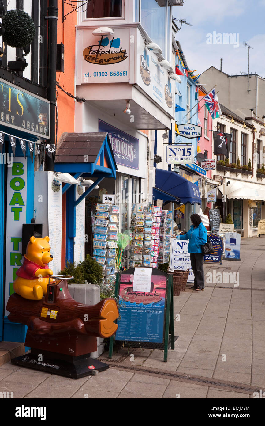 UK, England, Devon, Brixham Harbour, shops selling takeway food and ...