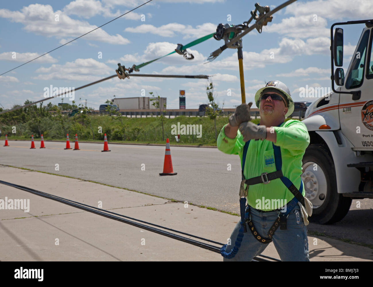 Electrical Workers Repair Power Line Damaged by Tornado Stock Photo - Alamy