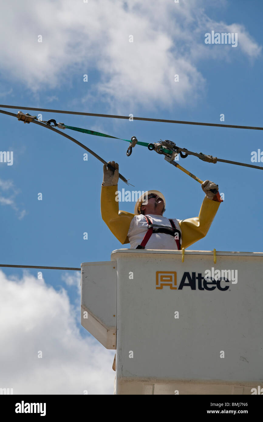 Electrical Workers Repair Power Line Damaged by Tornado Stock Photo - Alamy