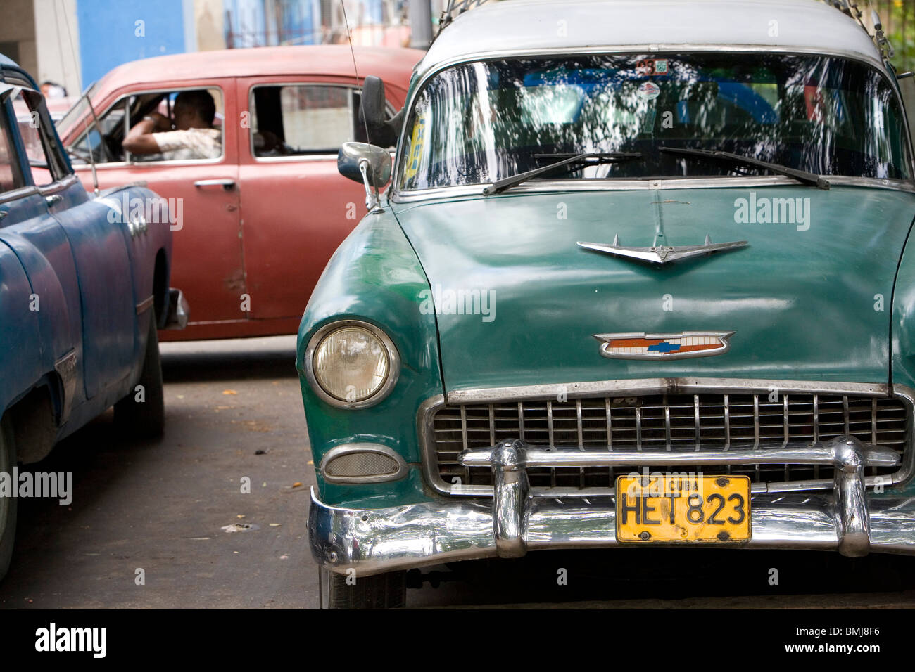 Classic American cars drive the streets of Havana, Cuba Stock Photo - Alamy