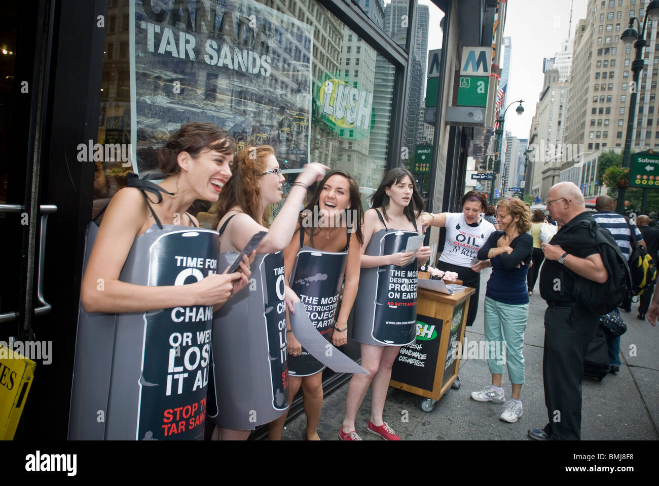 Employees of LUSH Cosmetics, wearing nothing but "barrels", protest ...