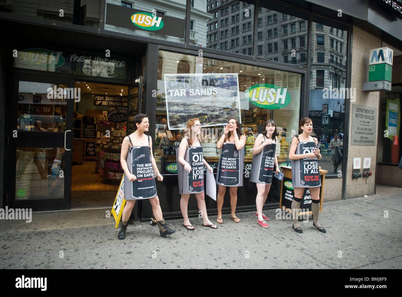 Employees of LUSH Cosmetics, wearing nothing but "barrels", protest ...
