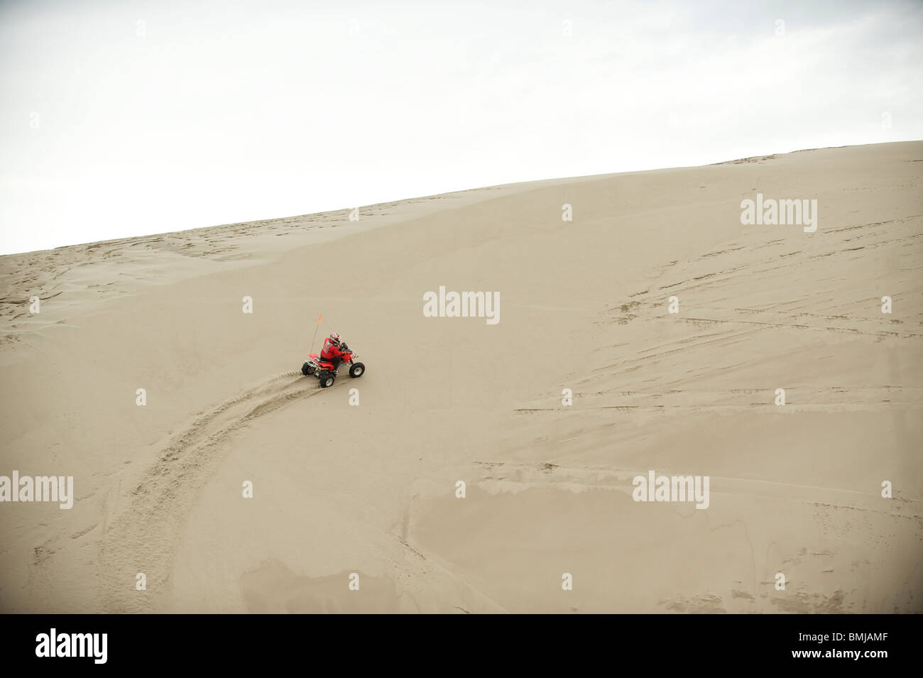 Dune buggies, quad bikes, ATCs and dirt bikes, ride through sand dunes ...
