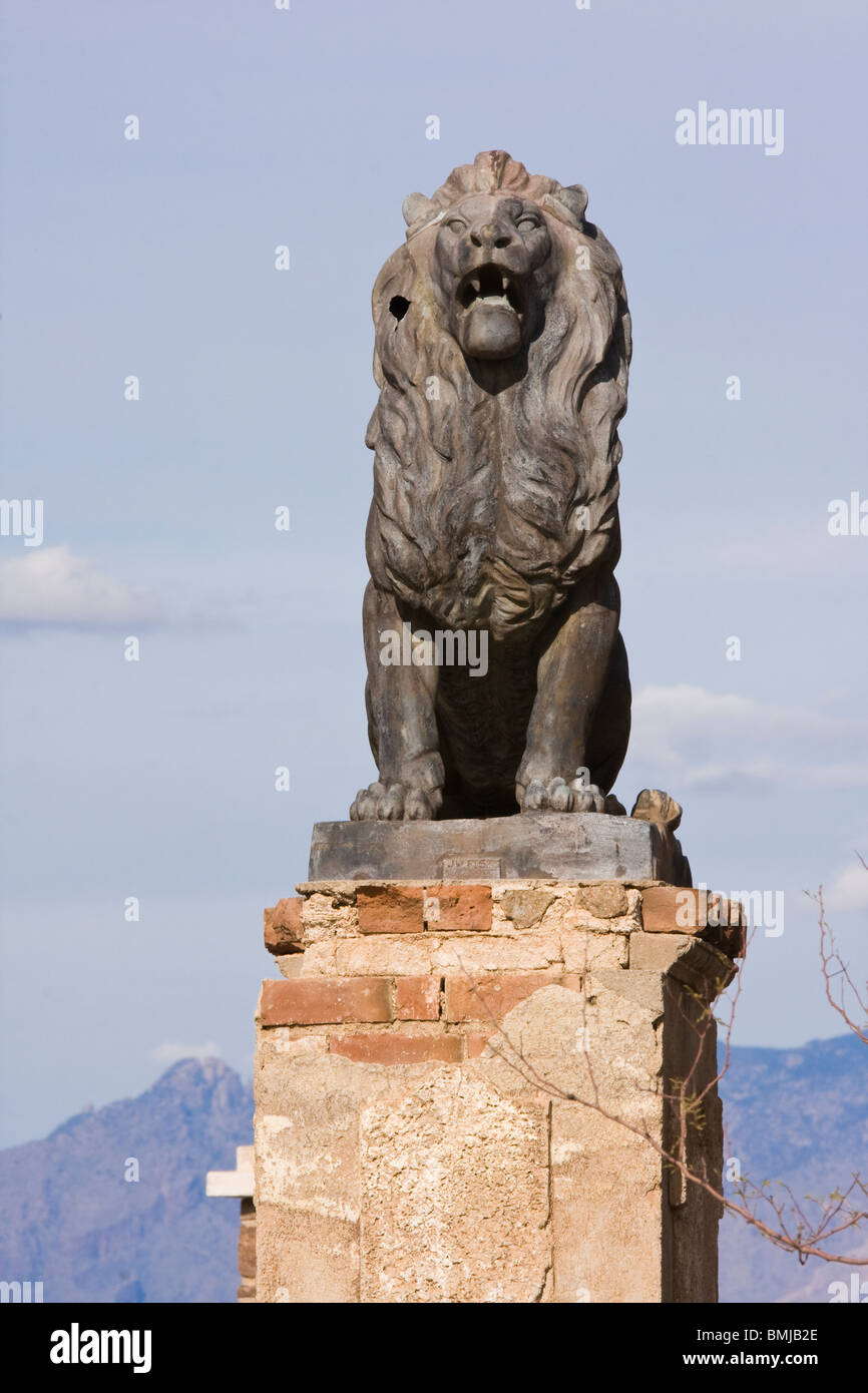 Lion statue at the Grotto Hill at San Xavier Mission, near Tucson ...