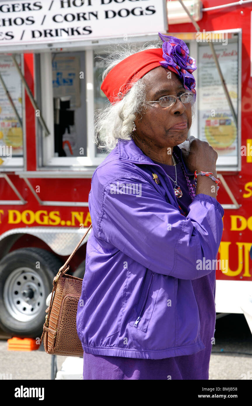 The Red Hat Society lady Stock Photo - Alamy