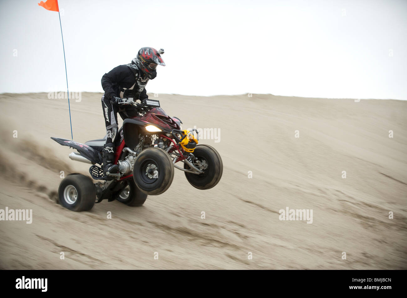 Dune buggies, quad bikes, ATCs and dirt bikes, ride through sand dunes ...