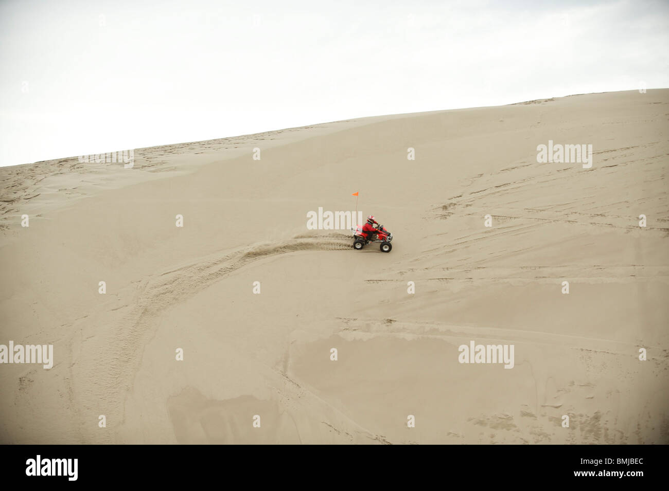 Dune buggies, quad bikes, ATCs and dirt bikes, ride through sand dunes ...