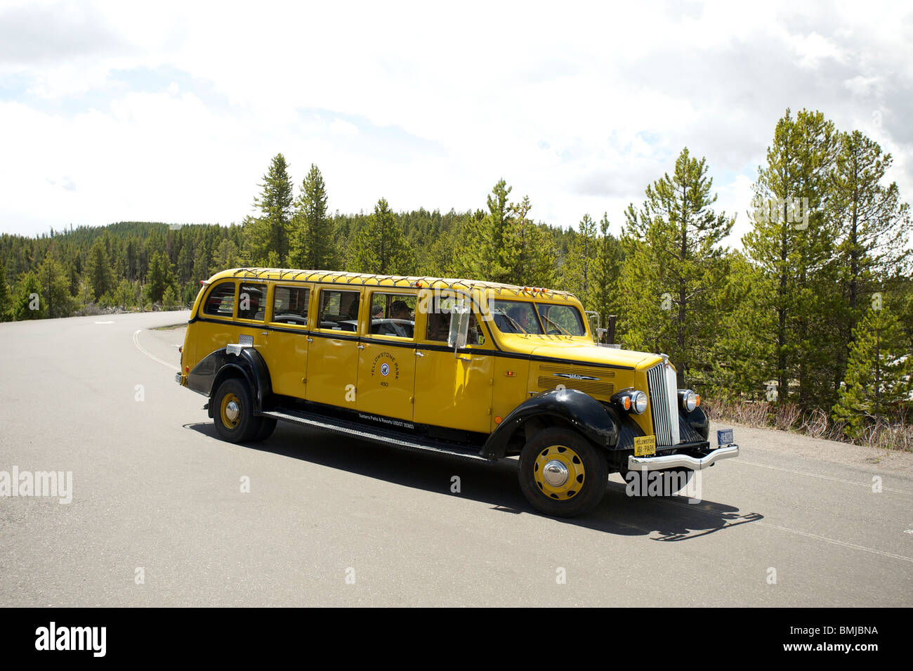 Antique shuttle bus, Yellowstone National Park. Wyoming, USA Stock ...