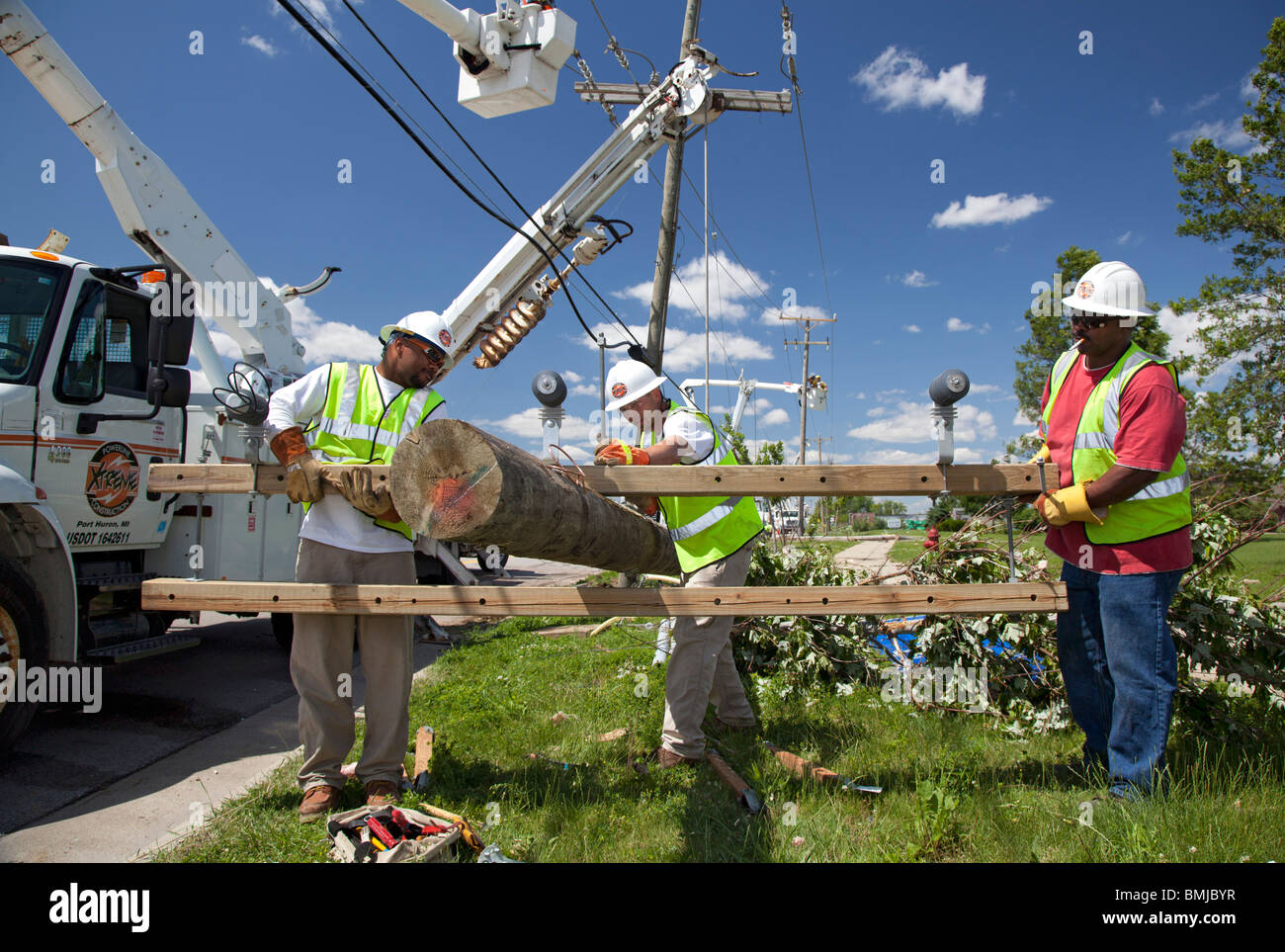 Electrical Workers Repair Power Line Damaged by Tornado Stock Photo - Alamy