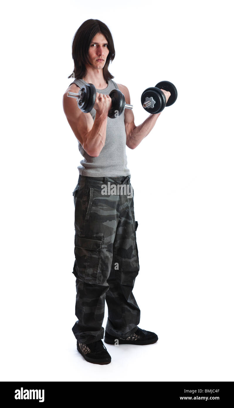 A young man working out with hand weights Stock Photo - Alamy