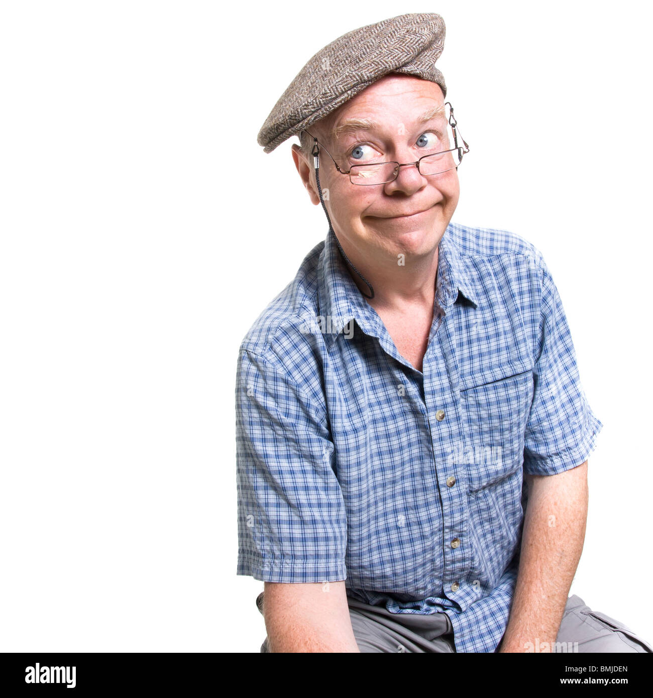 Expressive old man ogling isolated against white background Stock Photo ...