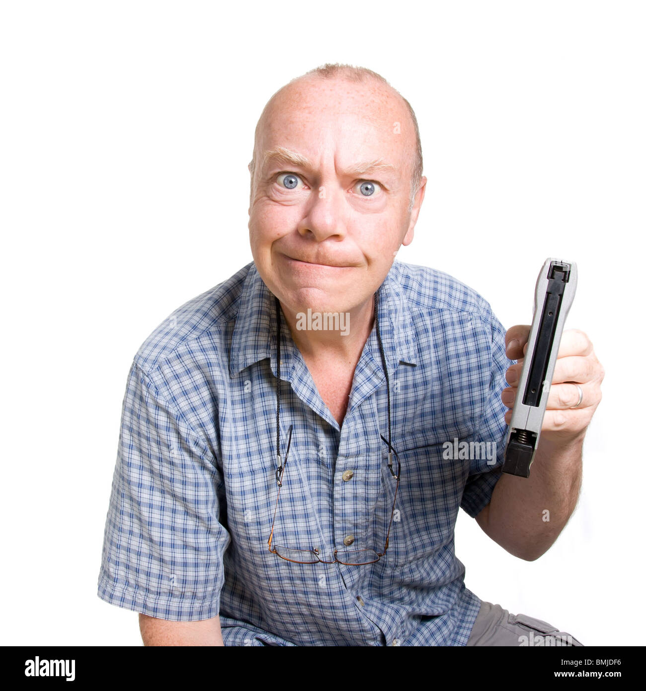 Expressive old man looking aggressive isolated against white background ...