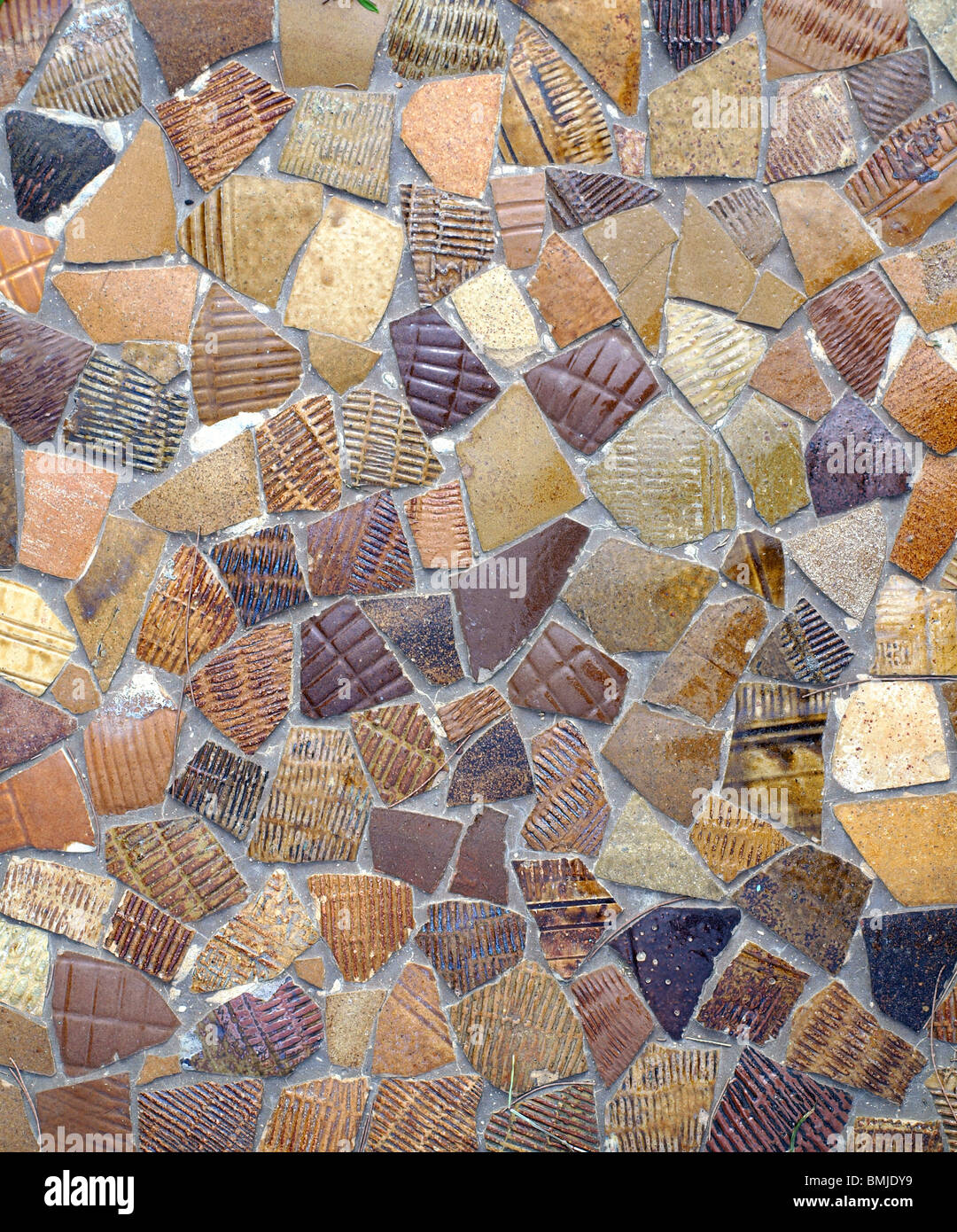 A pavement made out of a variety of pottery pieces Stock Photo - Alamy