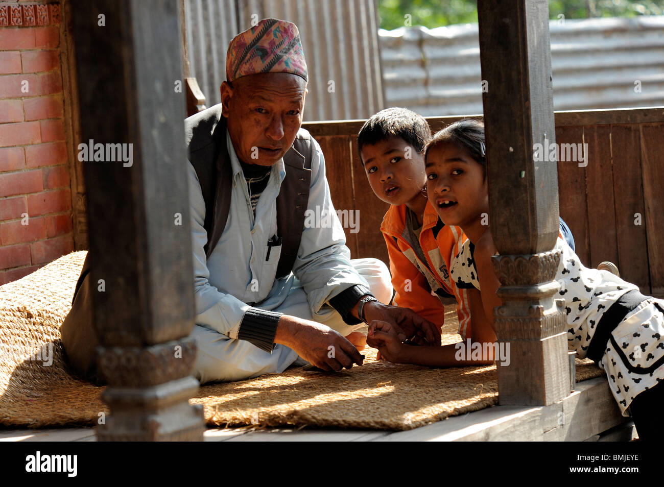 hindu devotee with grand children at the bisket jatra festival in Thimi ...