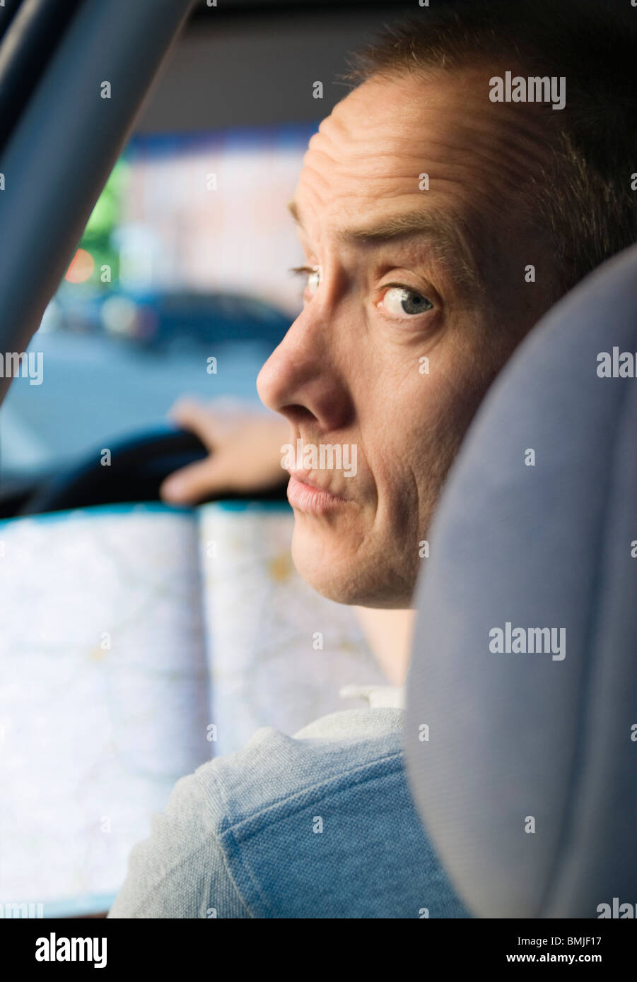 Driver looking back over shoulder hi-res stock photography and images ...