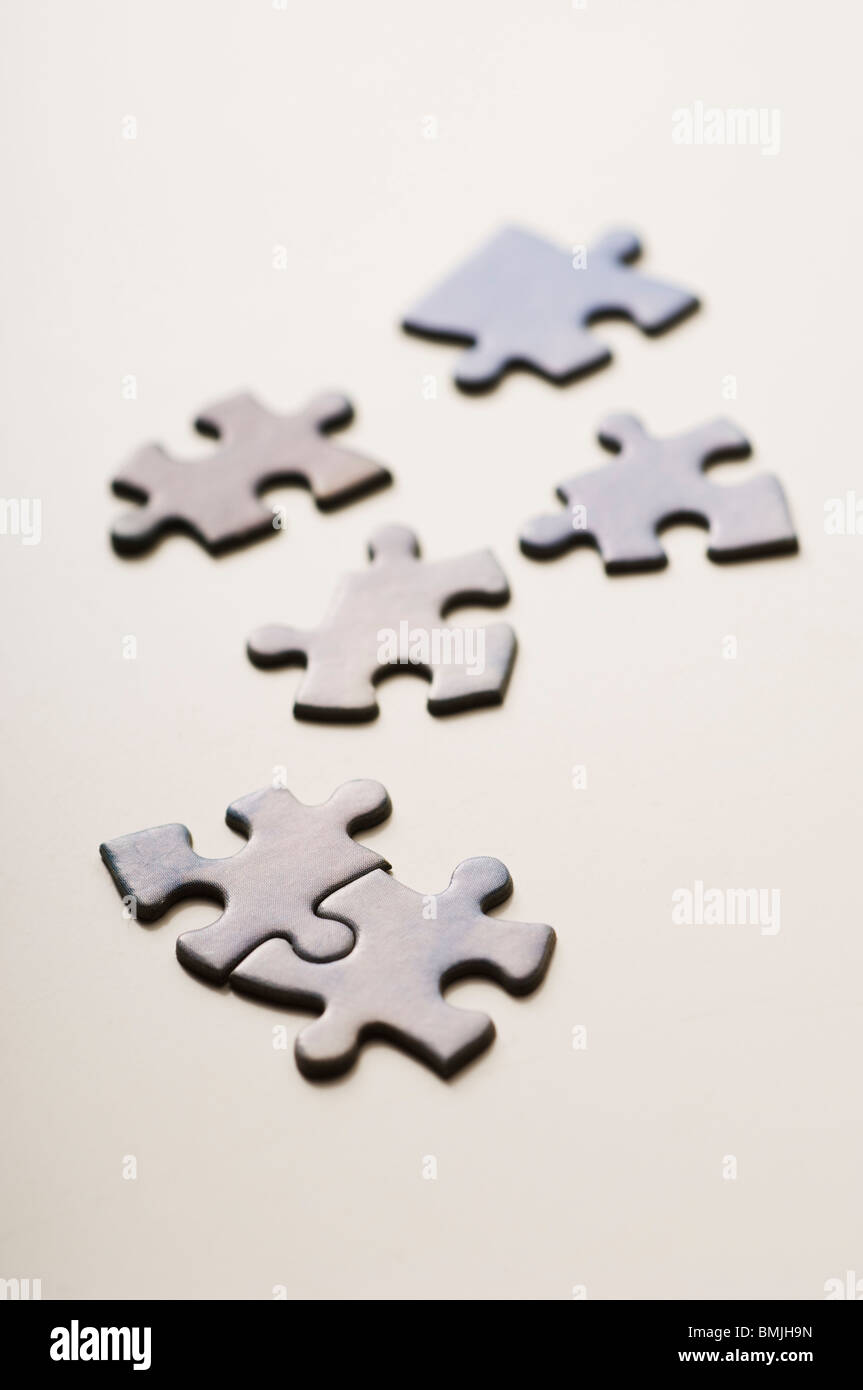 Jigsaw pieces, close-up Stock Photo - Alamy