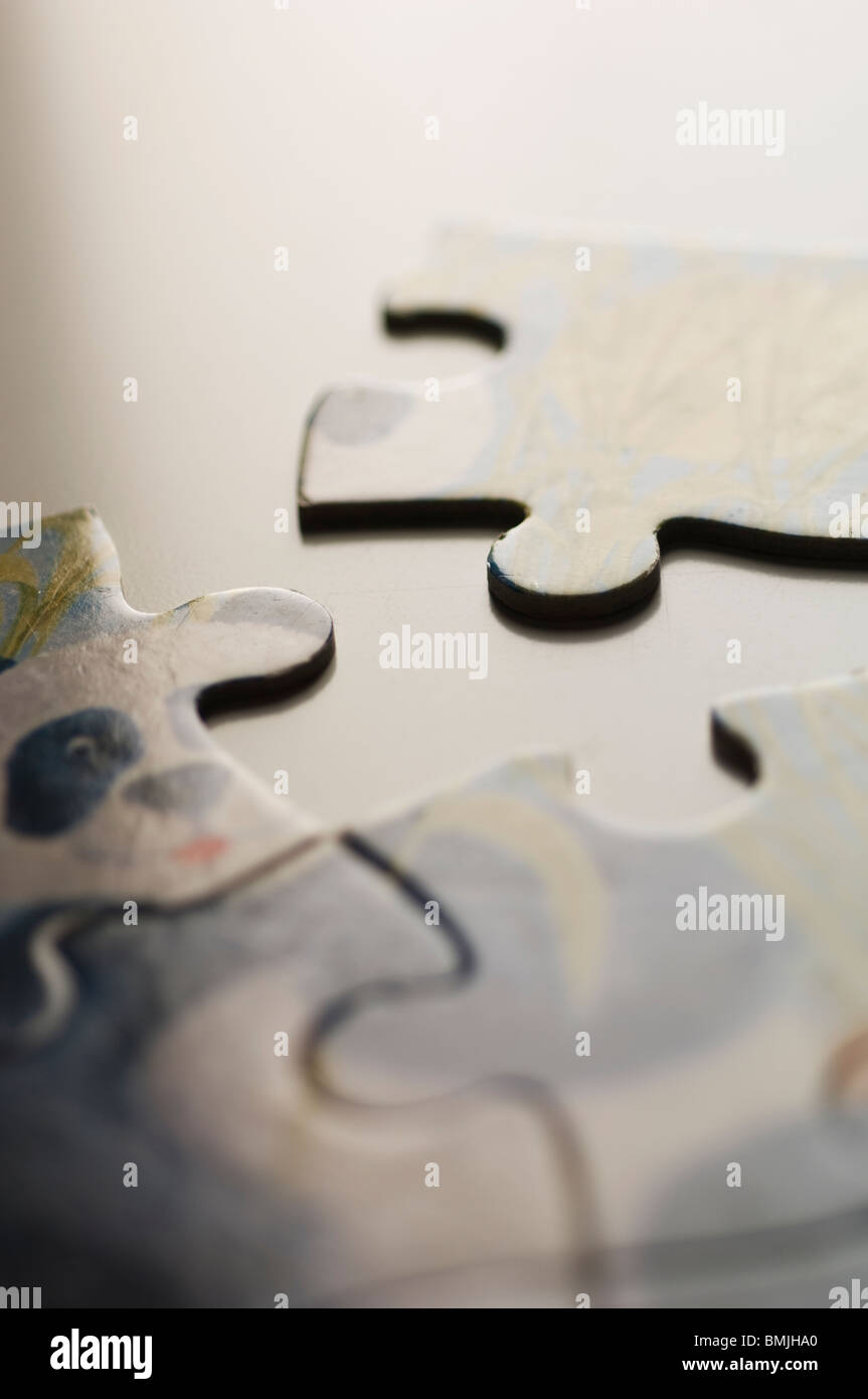 Jigsaw pieces, close-up Stock Photo - Alamy