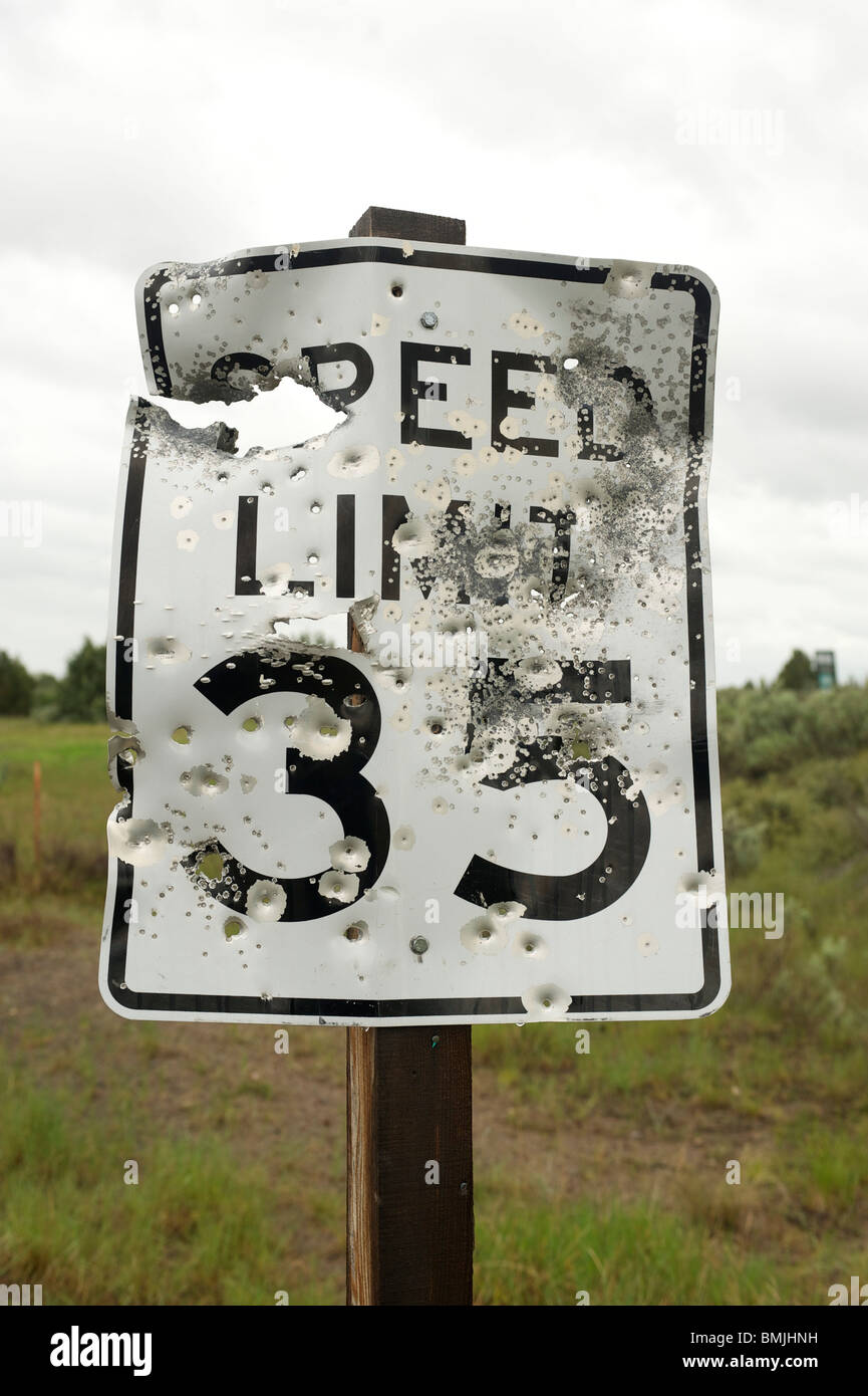 Sign bullet hole hi-res stock photography and images - Alamy