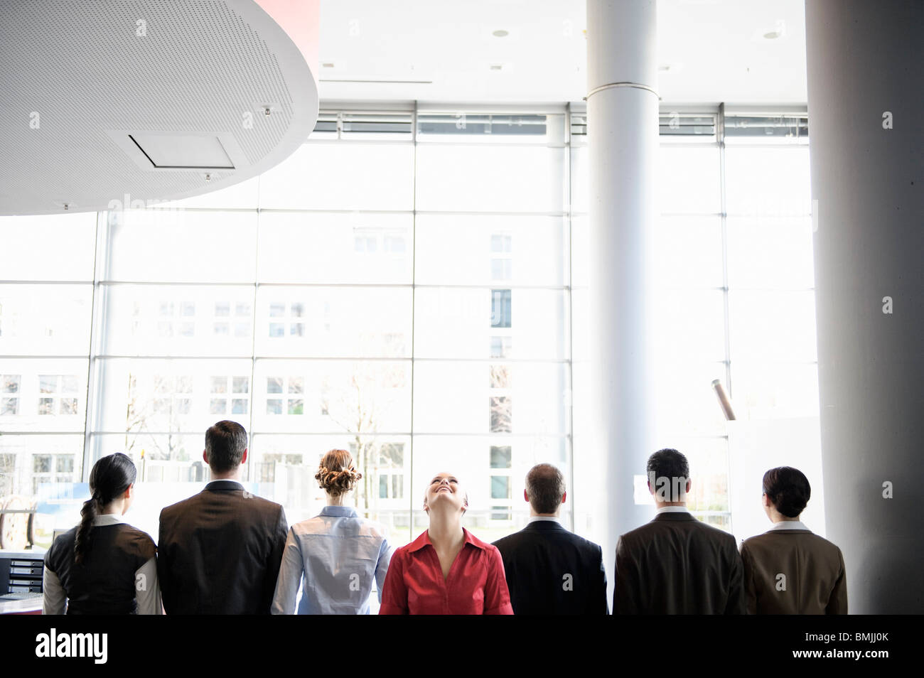 Business people standing in line Stock Photo - Alamy