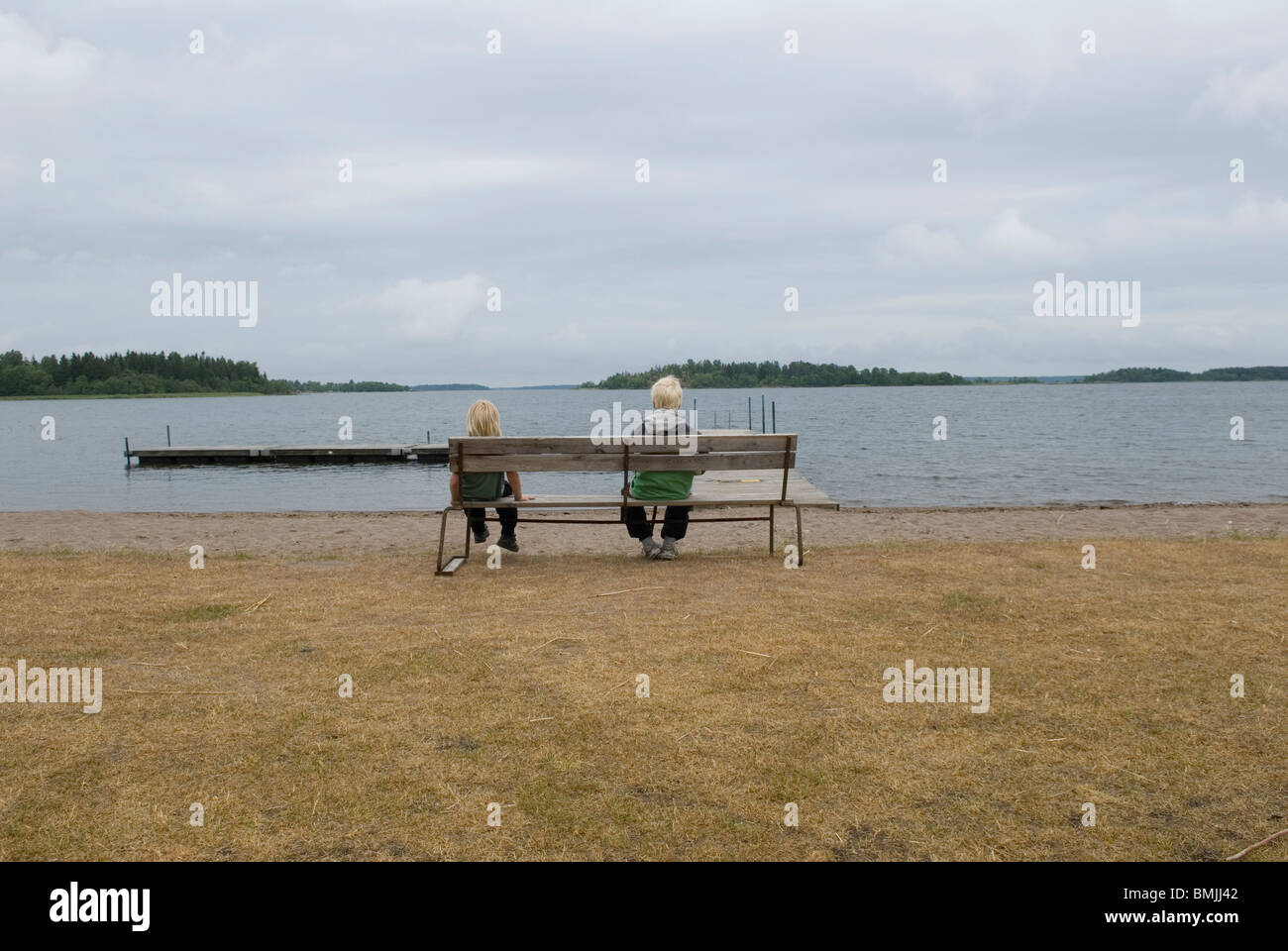 Seated beside lake hi-res stock photography and images - Alamy