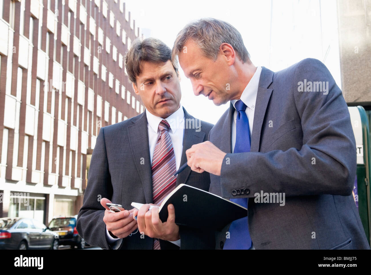 Men debating business hi-res stock photography and images - Alamy