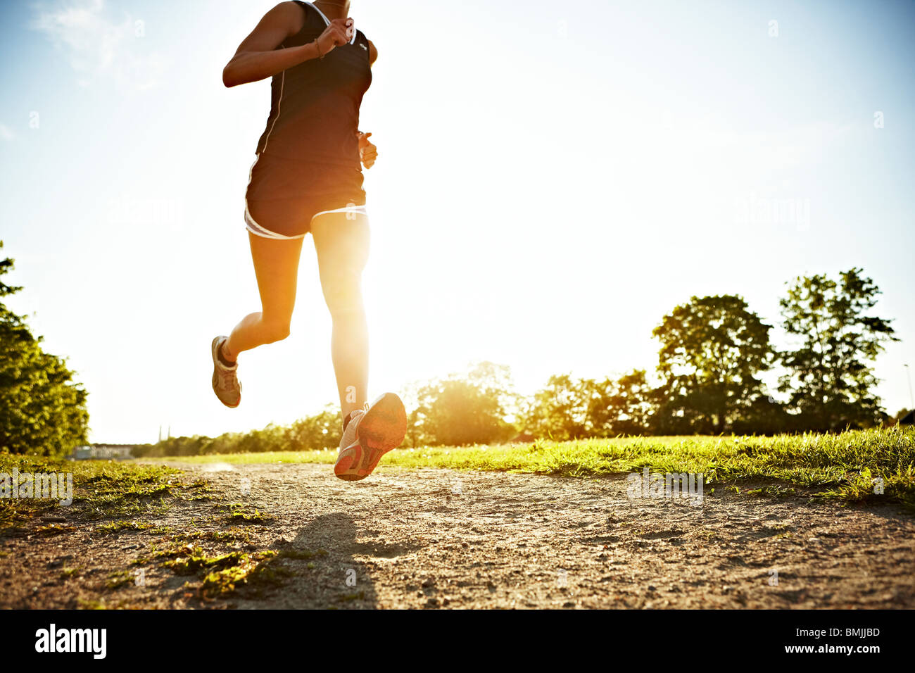 Woman suit and running shoes hi-res stock photography and images - Alamy