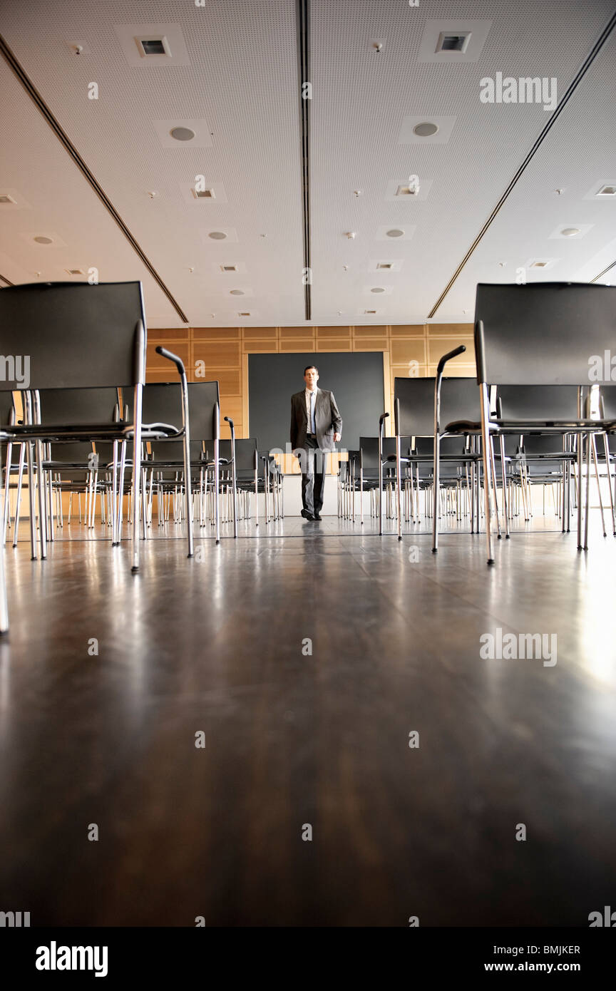 Businessman in empty conference room Stock Photo - Alamy