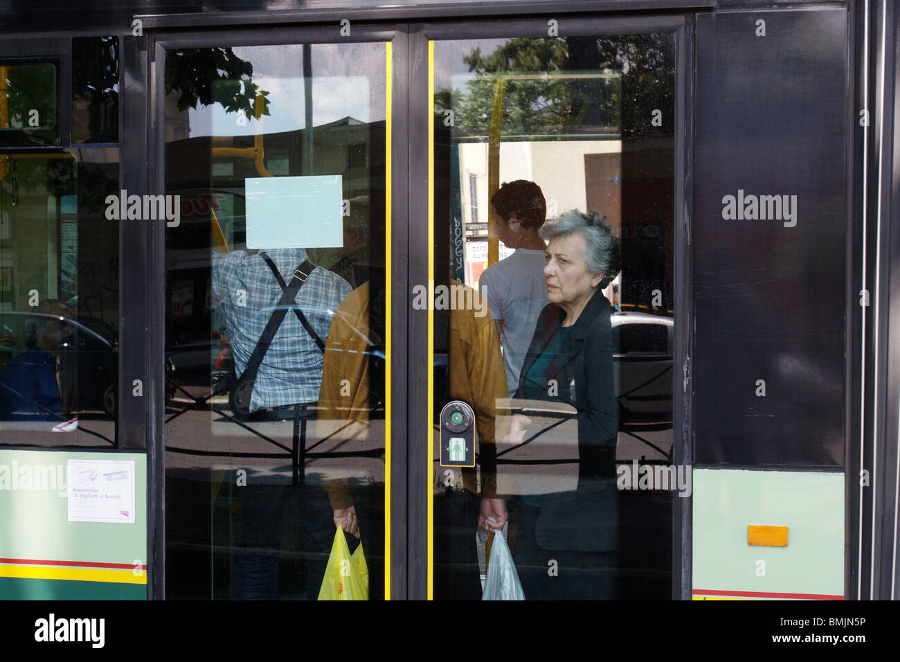 Elderly woman on bus Rome Italy Stock Photo - Alamy