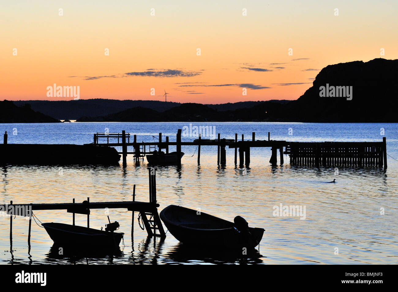 Boats at a jetty Stock Photo - Alamy