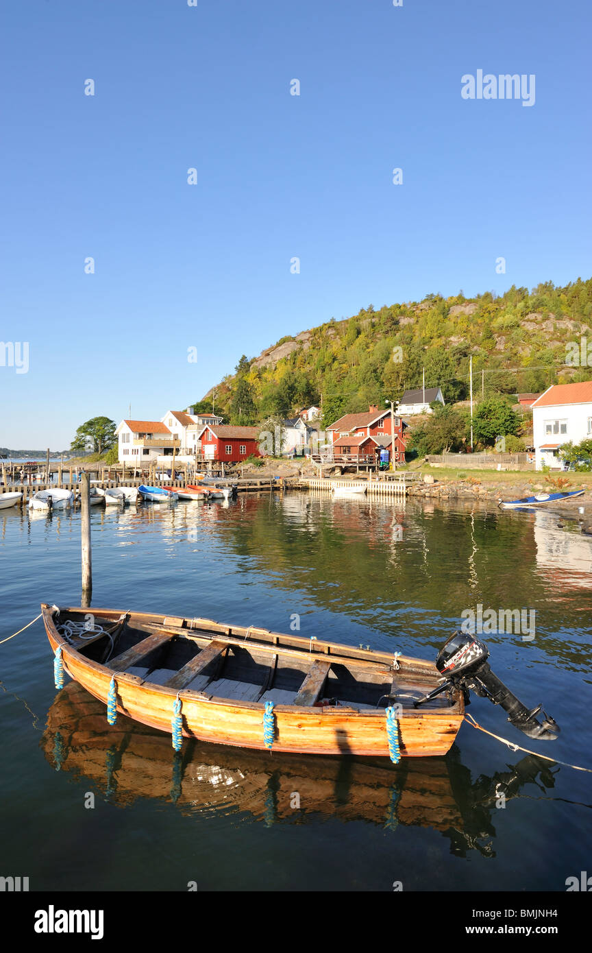 Wooden boat outside house hi-res stock photography and images - Alamy