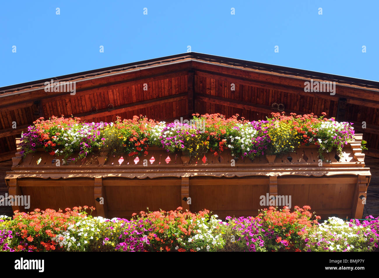 Europe, Austria, Balcony decorated with flowers, low angle view Stock ...