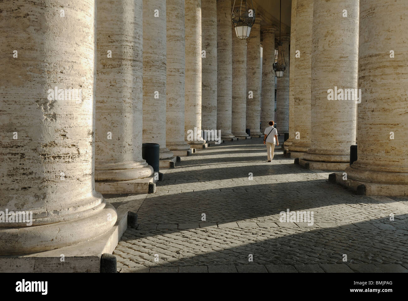 Berninis Colonnade surrounding Saint Peters square in the Vatican Stock ...