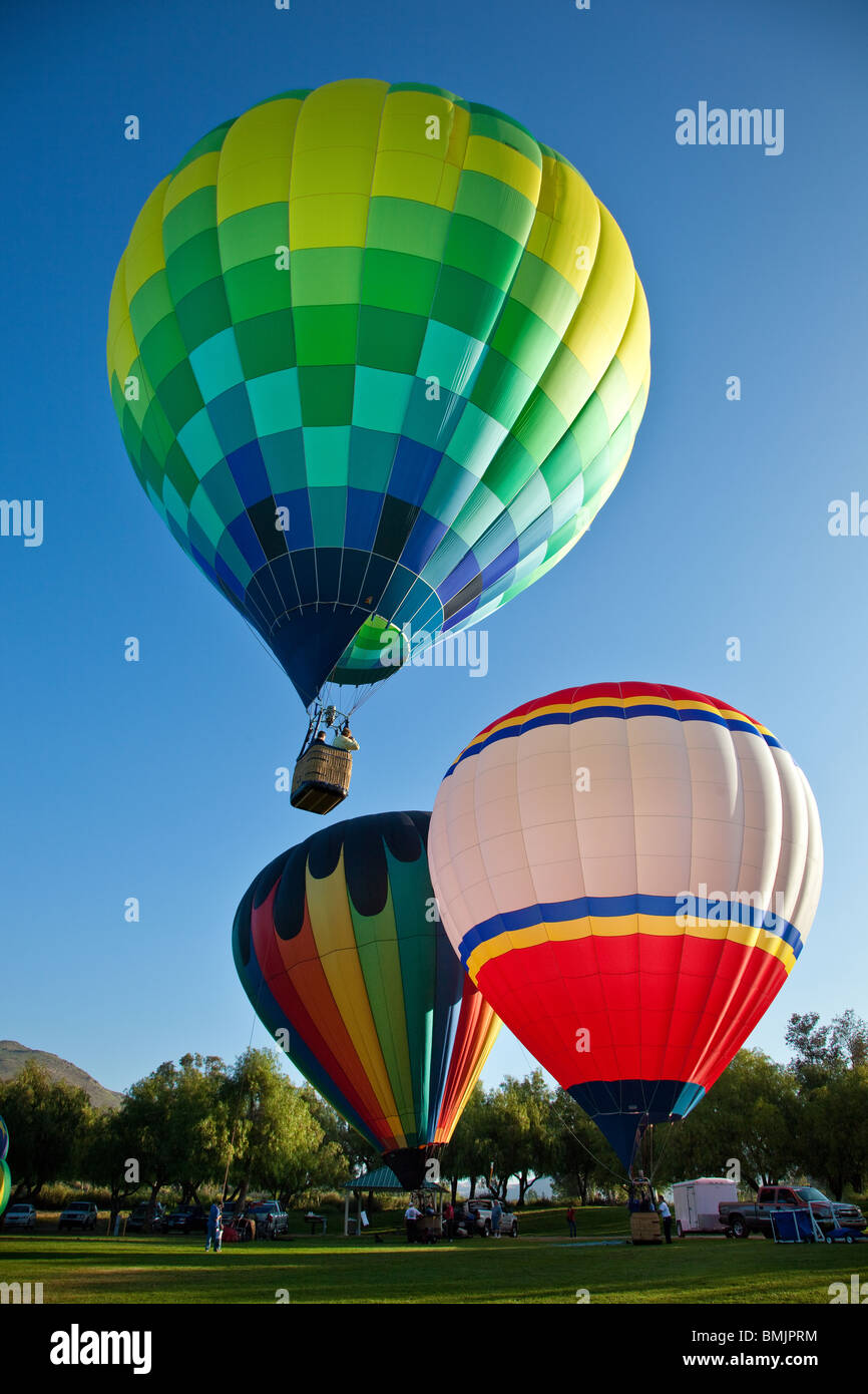 Hot air balloon lifts off Stock Photo - Alamy